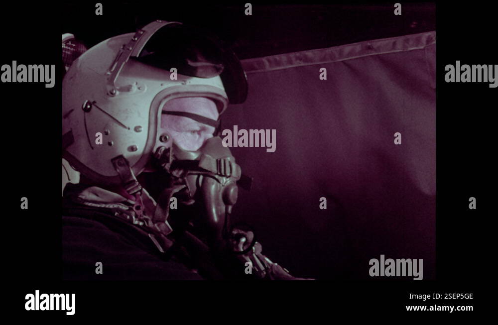 1960s: Pilot in a shaded cockpit. Slate. Pilot and co-pilot in a ...