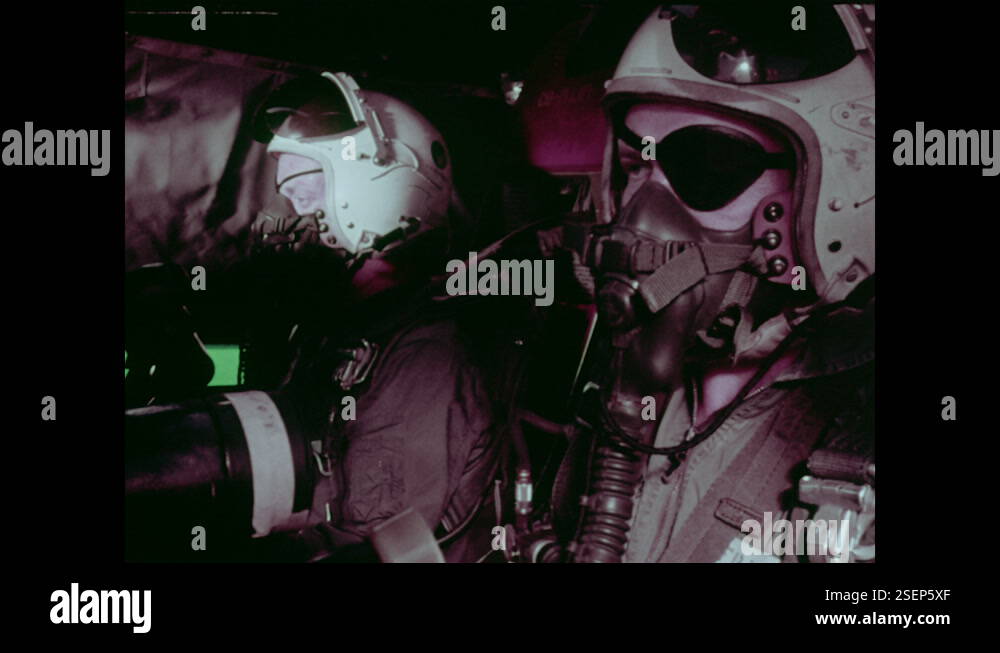 1960s: Pilot and co-pilot in a shaded cockpit wearing eyepatches. Pilot ...