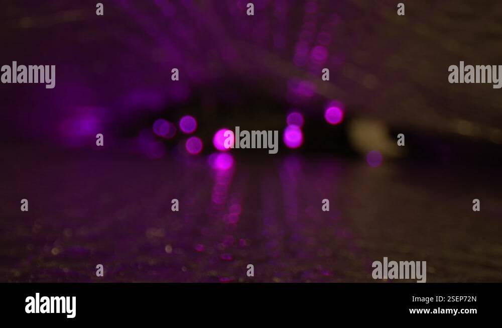 DEFOCUSED pulsating led lights reflecting off the top and bottom of the ...