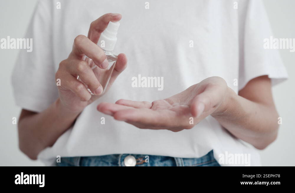 Young Woman Apply Sanitizer Spray on Hands for Cleaning Bacteria ...