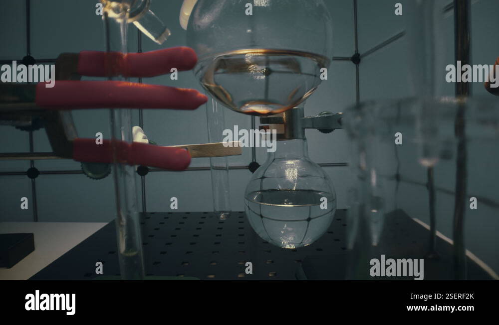 Chemical laboratory with flasks and test tubes. Chemical process with ...