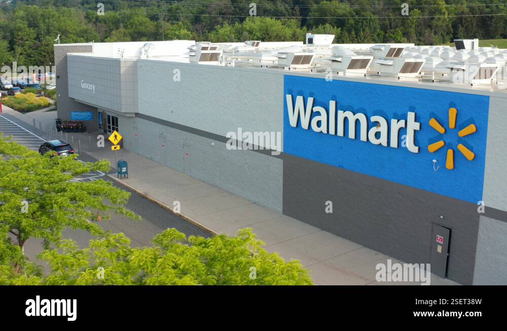 Walmart supercenter mega store. Logo on front entrance sign. Aerial ...