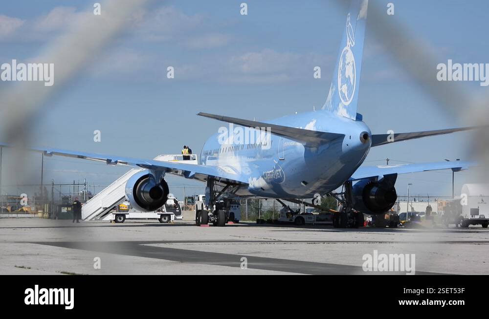 Rapper Drake's airplane parked at Toronto Pearson Airport. Unloading ...
