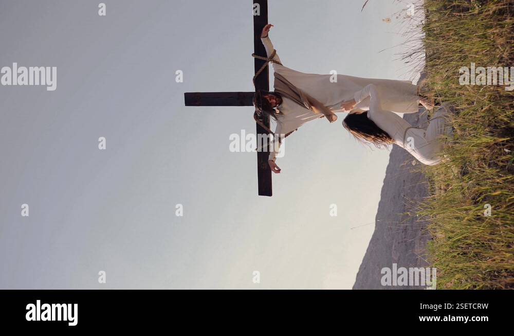 Mary mourns the death of Jesus at his feet. Jesus is crucified on the cross Stock Video Footage ...