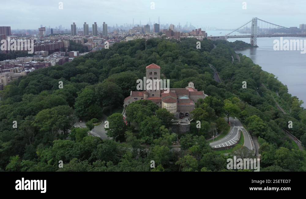 Long and slow aerial level orbit of The Cloisters museum in Upper Stock ...