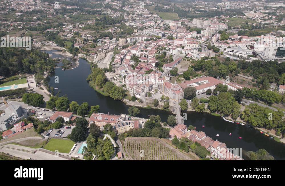 Establishing aerial above view of the historic parish townscape and ...