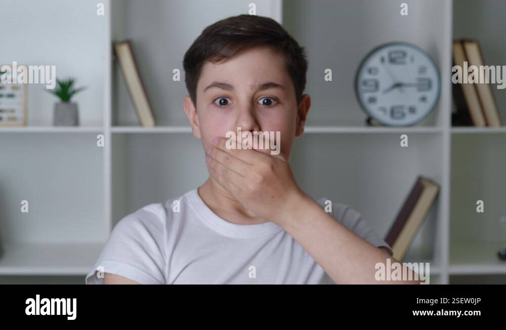 Portrait of scared boy shocked by terrible scene, afraid teenager look ...