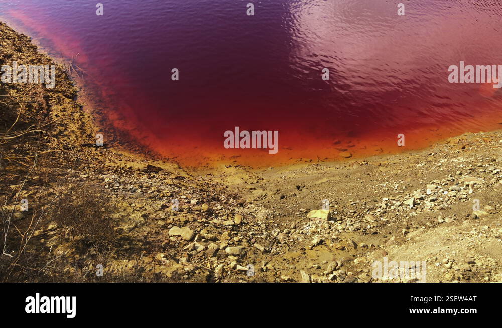 Toxic Red Waters Of Lagoon In Wheal Maid (Cornish Mars), Former Mine In ...