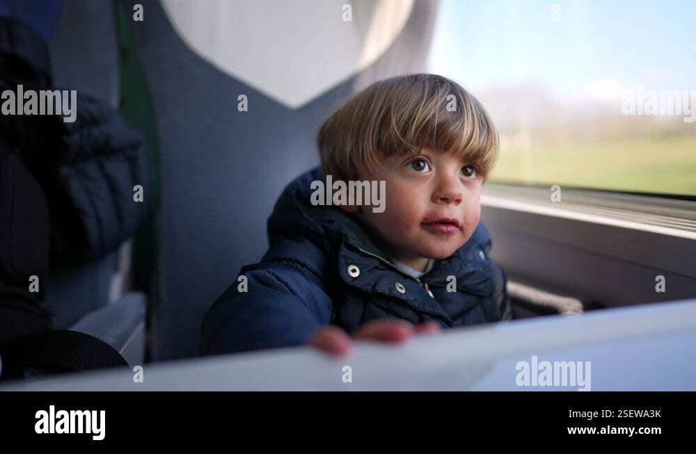Little boy passenger train seated on train. Kid travelling trip Stock ...
