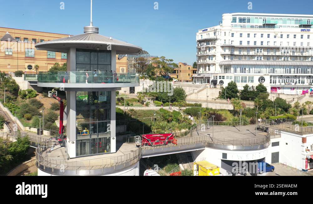 People standing on lookout platform with transparent glass wall Stock ...