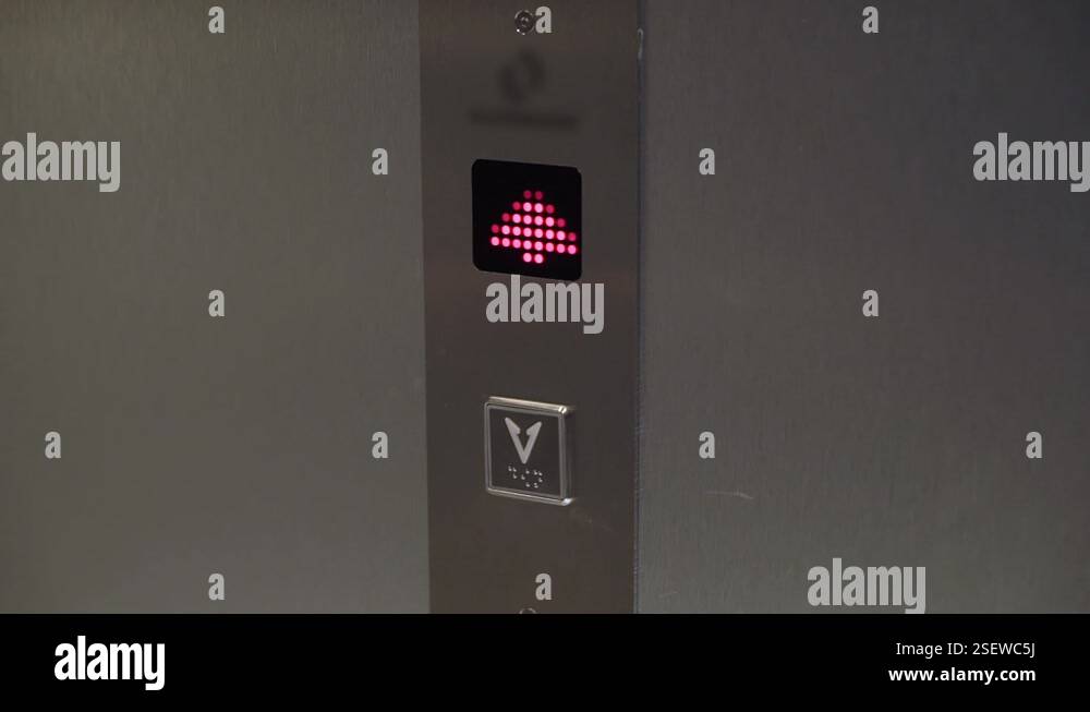 Elevator board on the floor. The lift goes up. Button with arrow and ...