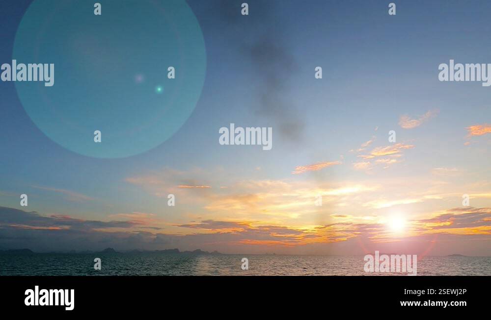 Bokeh sun light ray n sunbeam lens flare on golden sunset blue sky ...