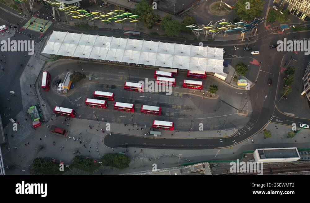 Red London buses drive in bus station in Great britain Stock Video ...