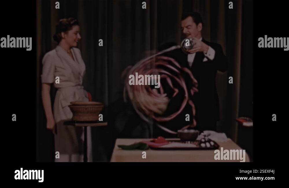 1950s: Magician pulling huge amount of paper streamer from tiny silver ...