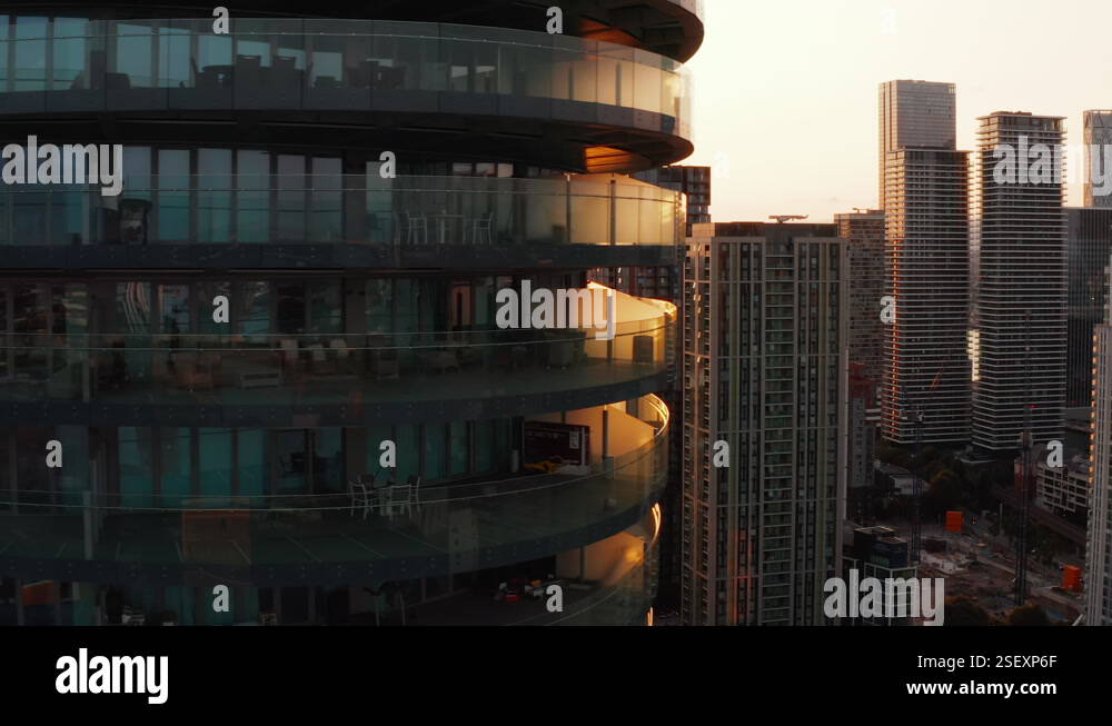 Tall modern building with glass walls. Revealing skyscrapers in ...