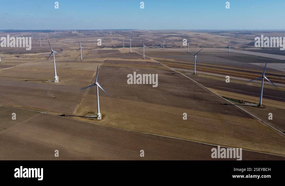 Wind turbines spread out over vast area on wind park, aerial shot Stock ...