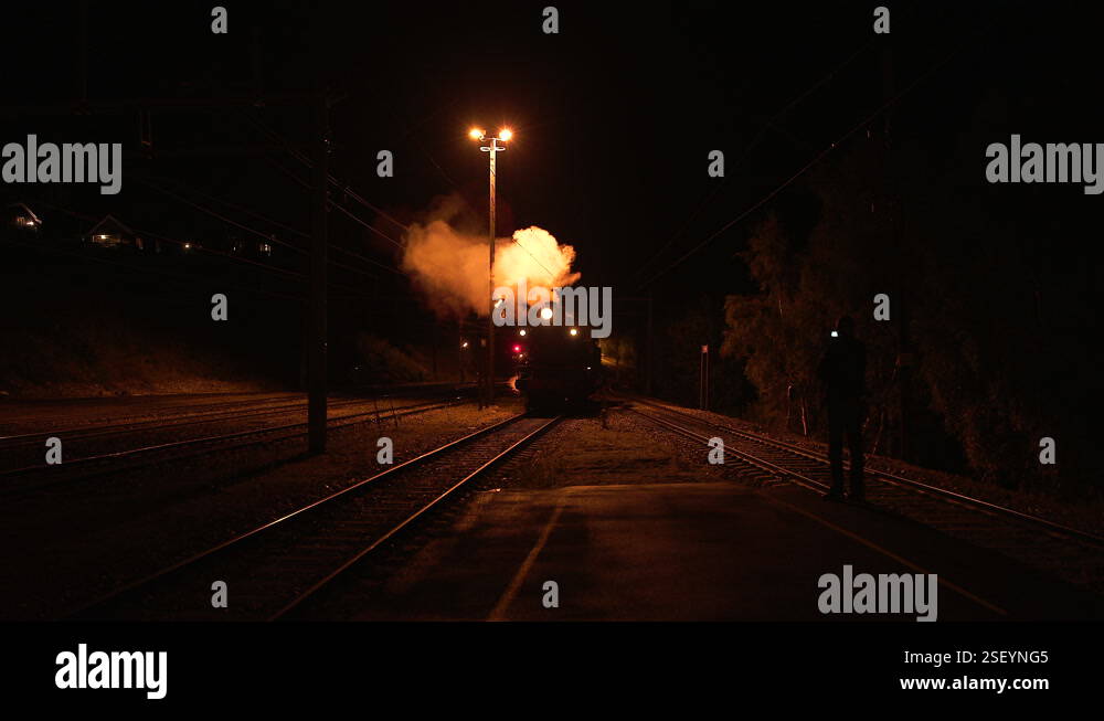 steam locomotive nsb class 30 at station night approach front view ...
