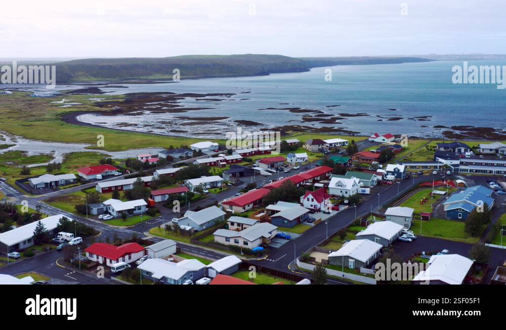 Aerial View Of Village Houses In Coastal Town Of Vogar In Iceland. wide ...