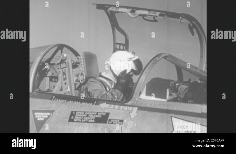 1960s: Pilot puts on helmet. Man moves ladder away from plane. Jet ...