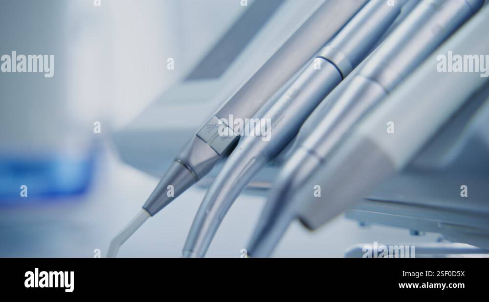 Dentist takes a dentistry drill tools and starts working, dental ...