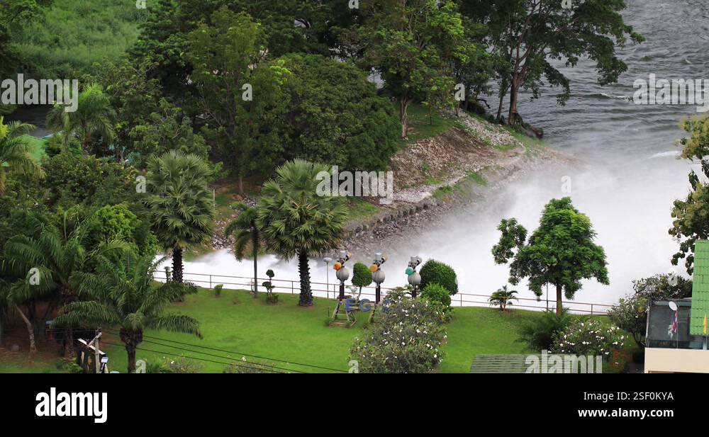Hydro Plant with Gushing Water from a Reservoir into a River in ...