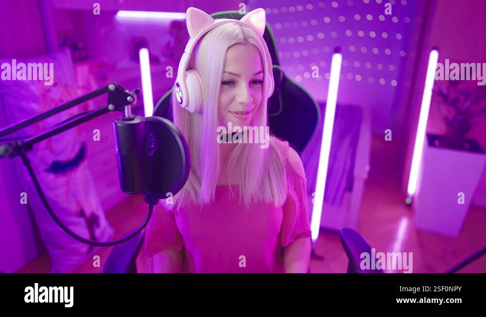 Cute gamer girl streamer with cat headphones clap to viewers 4K Stock ...