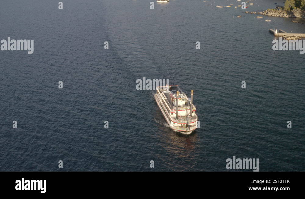 Fly over of the M.S. Dixie II as she departs on a sunset cruise of Lake ...