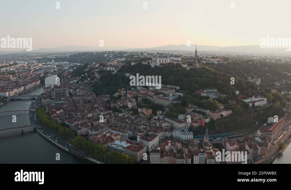 Dolly forward drone shot towards the basilica of Lyon and transmitting ...