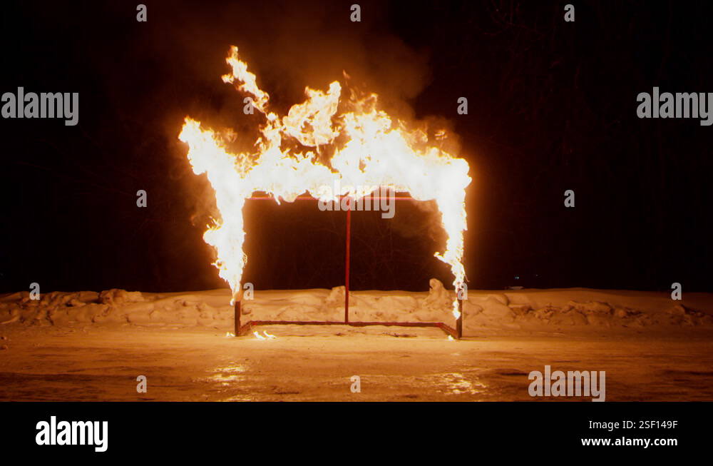 Carcass of hokey gate in burning flame on ice arena Stock Video Footage ...