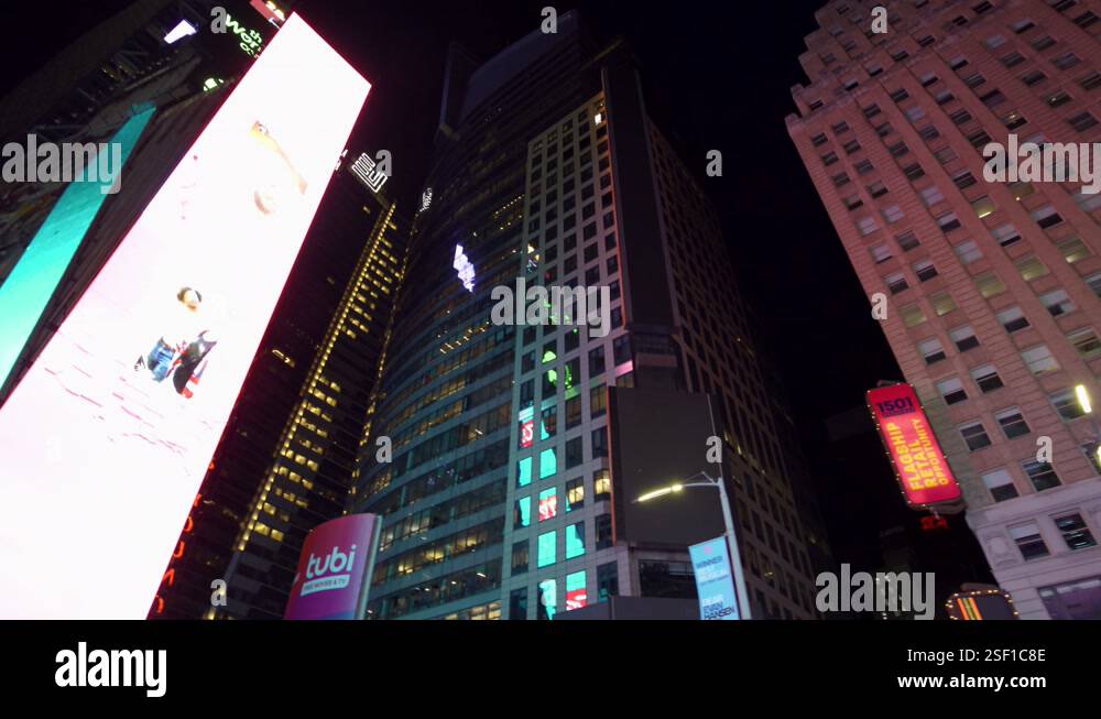 Look up Time square illuminated Buildings, colorful lights at Night ...