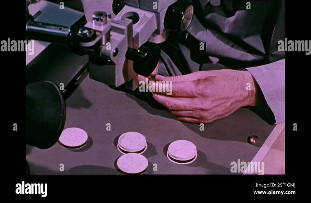 1970s Technician Examines A Shell Casing He Scribes The Casing And Bullet Stock Video Footage