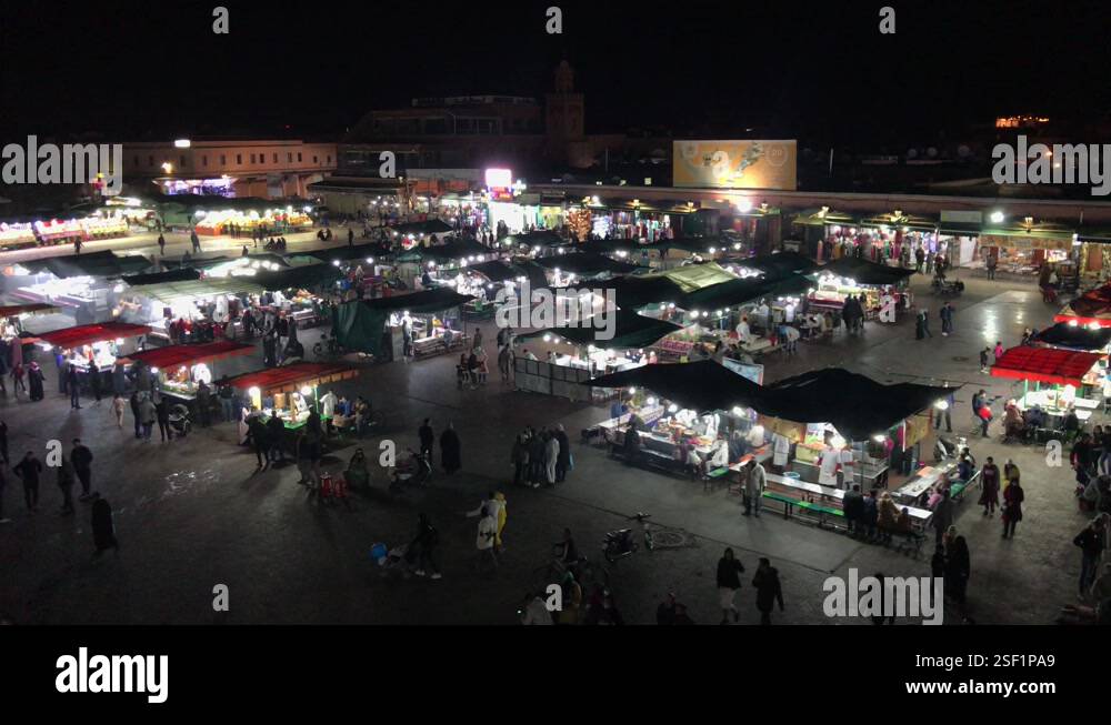 Establishing the Jemaa el Fna square at night in Marrakesh, Morocco ...