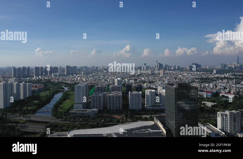 Drone tracking shot of Ultra modern city with highway, river, green ...