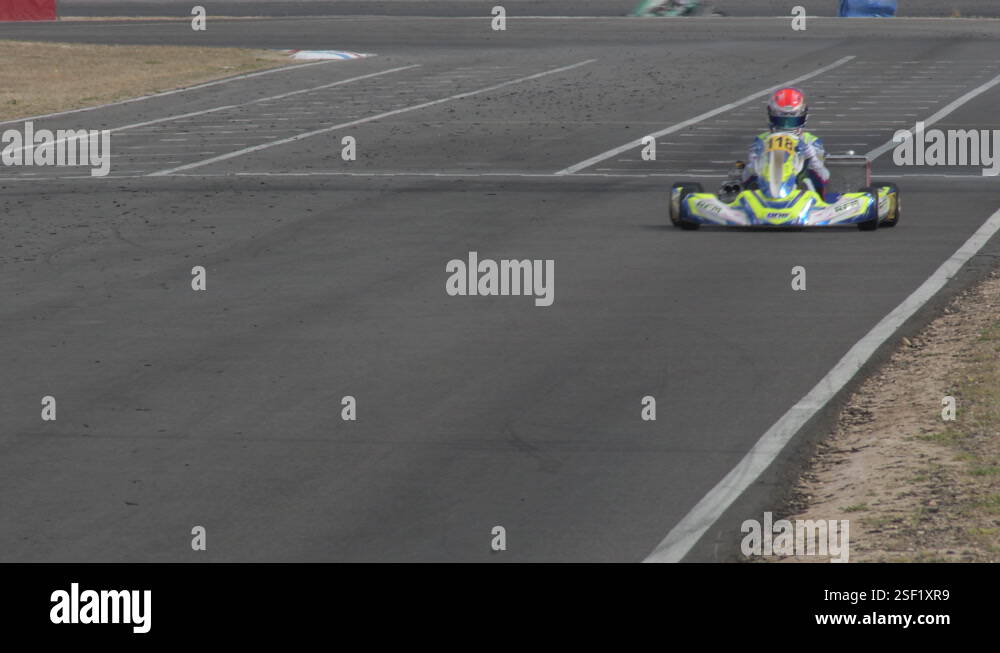 Karts running in a karting race competition in a circuit Stock Video ...