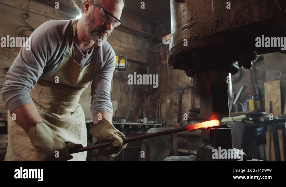 Blacksmith Working with Pneumatic Power Hammer Stock Video Footage - Alamy