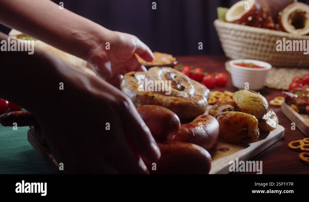 Putting fried sausages close-up. Cafe restaurant with european ...