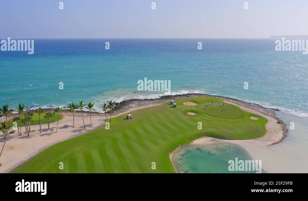 People play golf seaside at Corales Golf Course, Punta Cana Resort in ...