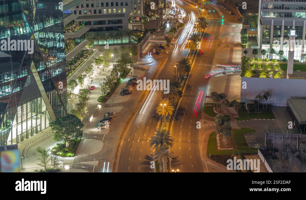 Skyline view of traffic on Al Saada street near DIFC district night ...