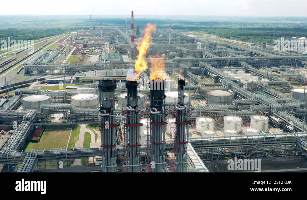 Flare stacks and facilities of the petroleum-processing plant Stock ...
