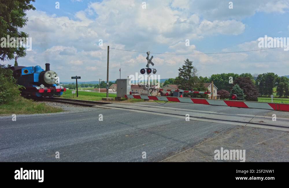 View of Thomas The Tank Engine Approaching Crossing a Crossing Gate ...