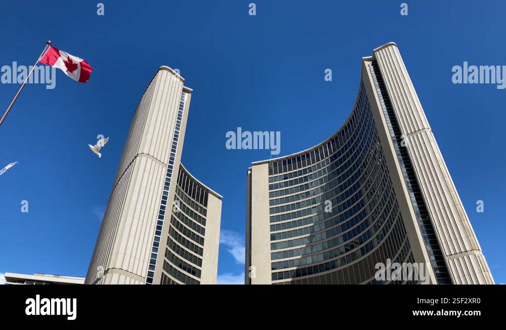 Toronto City Hall municipal government building with Canada flag and ...