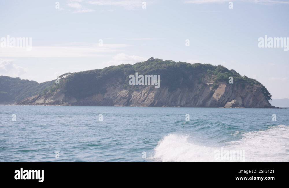 Tomogashima Island, viewed from departing boat crossing Seto Inland Sea ...