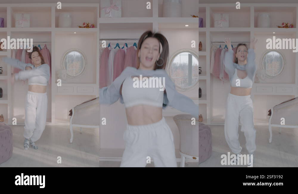 Teenager girl recording trendy dance moves for social media account ...