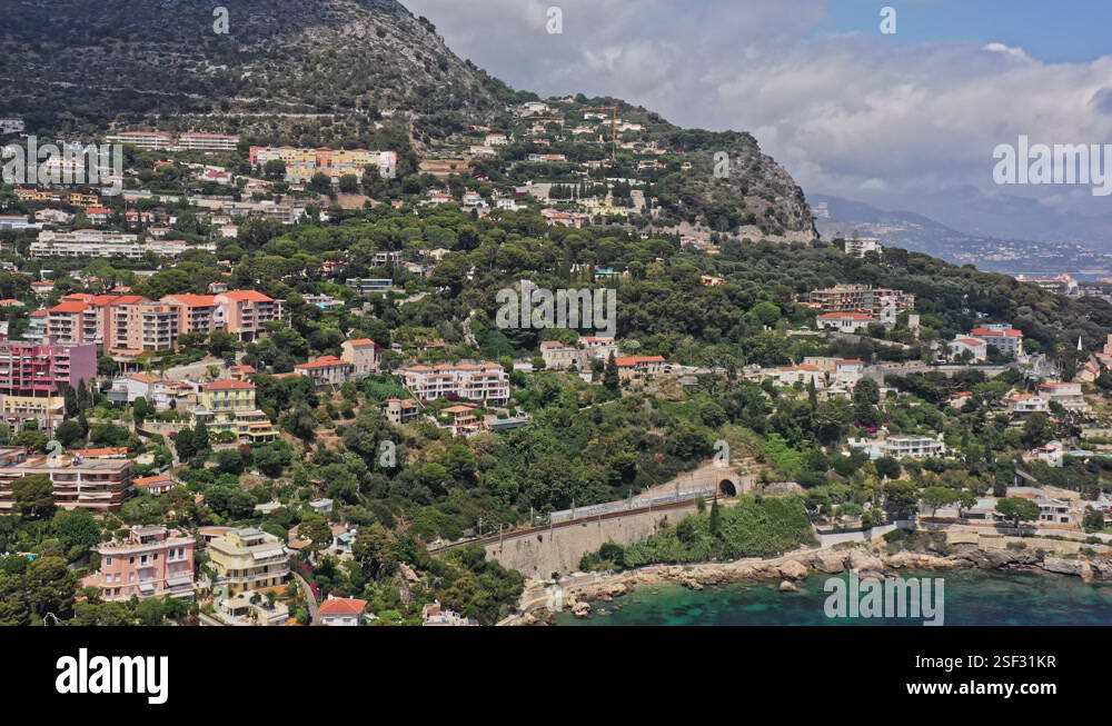 Cap d'Ail France Aerial v2 establishing pan right shot capturing ...
