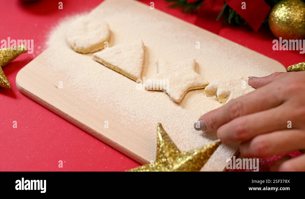 Taking one gingerbread cookie in squid game dalgona candy shapes for ...