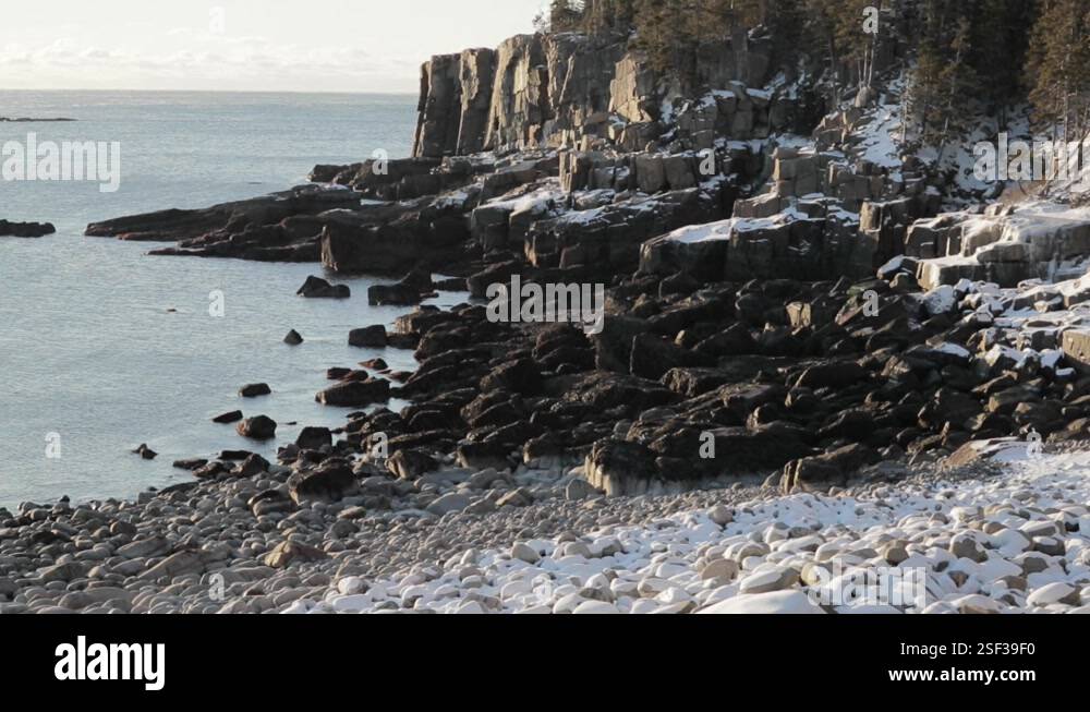 Rocky and rugged coastline of Maine in Acadia National Park after a ...