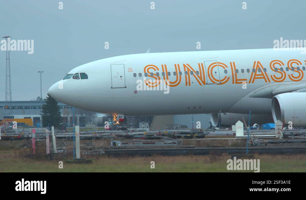 airplane airbus a330 sunclass airlines taxiing side view oslo airport ...