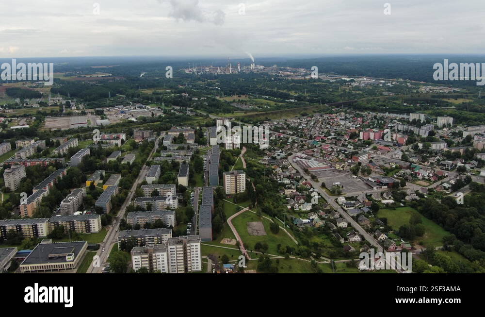 Apartment buildings of Jonava and Achema chemical industrial factory in ...
