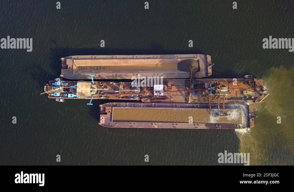 Floating Barge Extracting Sand and Gravel from River Bottom. Aerial ...