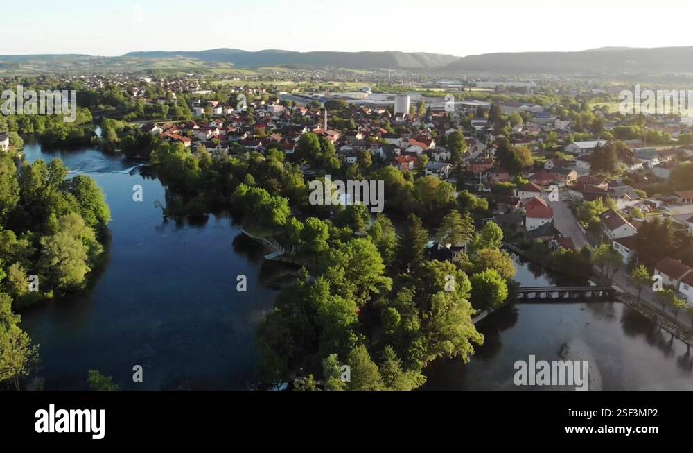 Drone shot of the Bosnian city of Bihac with its beautiful Una River ...